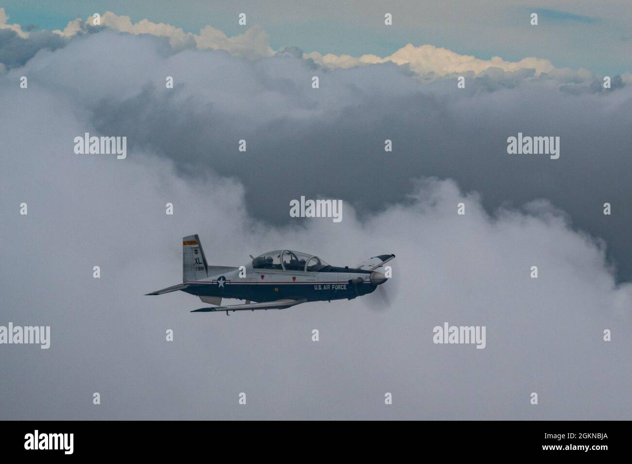 A Texan II T-6 fly’s though the air as it performs standard training ...