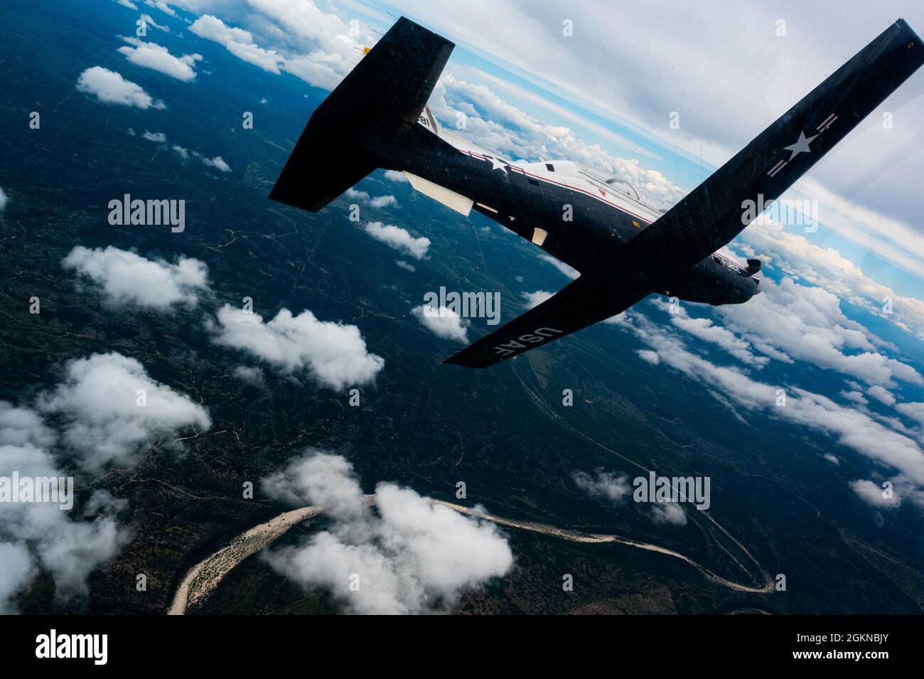 A Texan II T-6 fly’s though the air as it performs standard training ...
