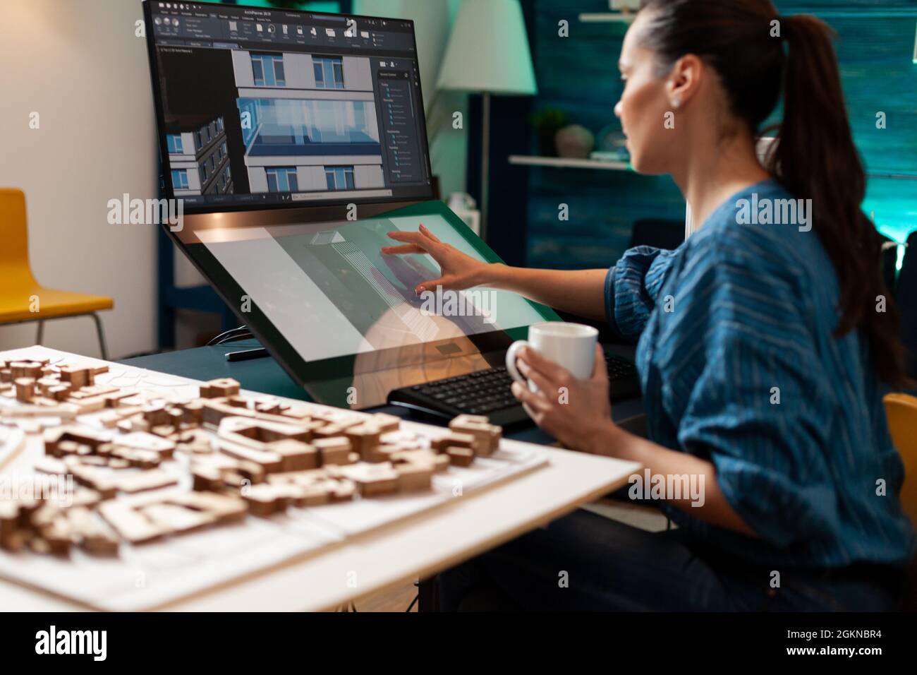 Architectural designer doing engineering sketch using touchpad screen ...