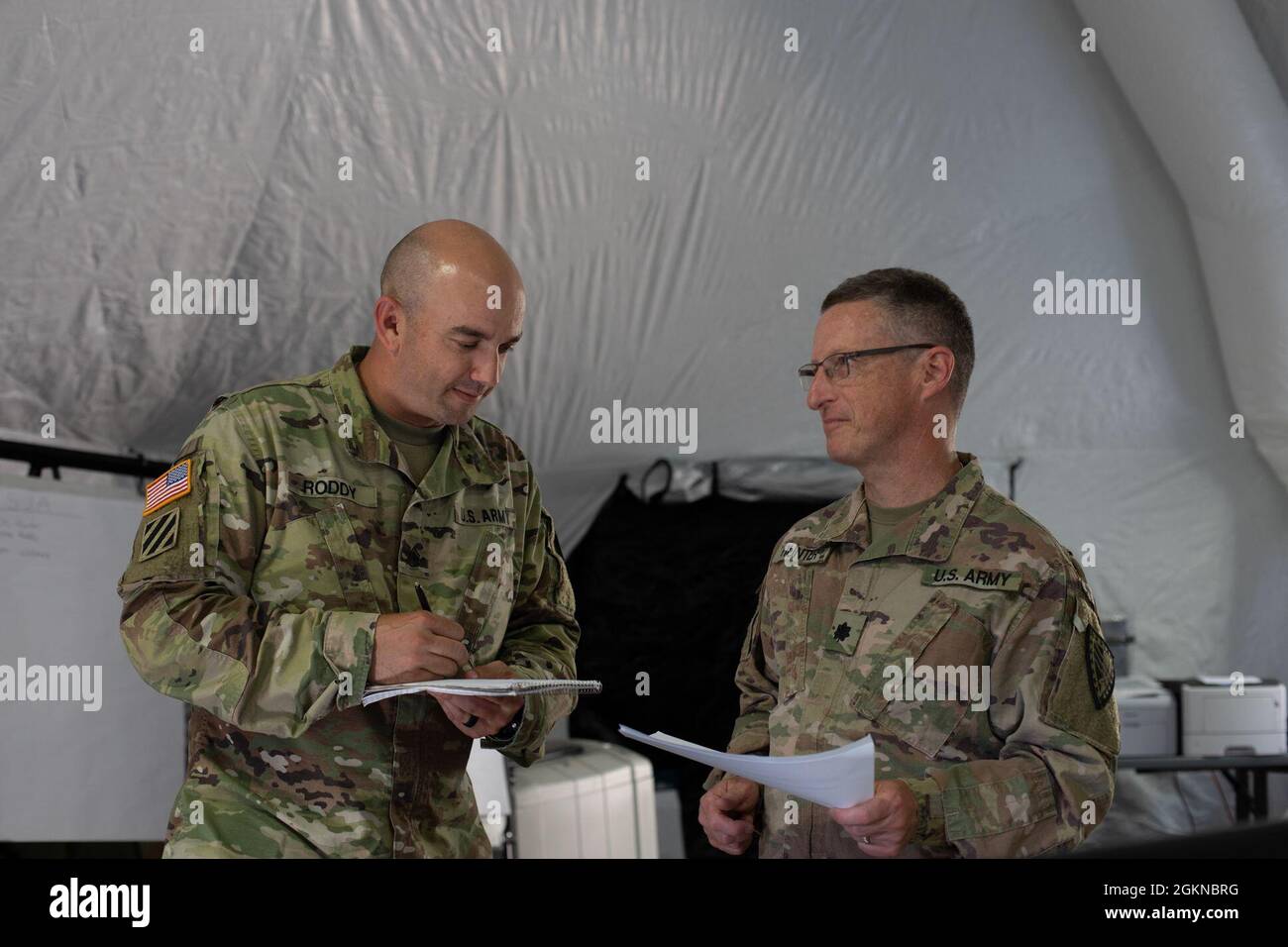 Indiana National Guard Lt. Col Justin Hunter, right, 38th Sustainment ...