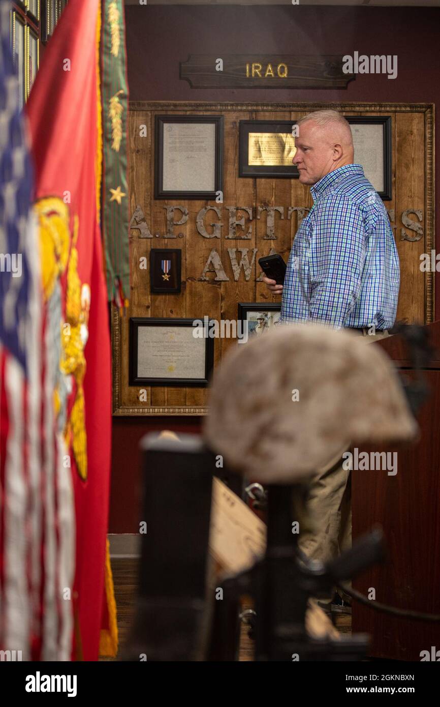 Retired U.S. Marine Corps Sgt. Maj. Larry Harrington observes memorial ...