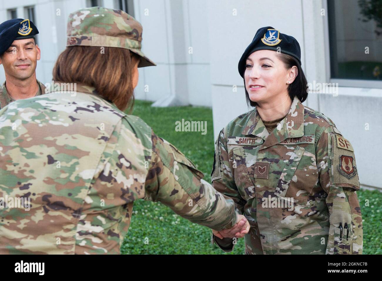 Chief Master Sergeant of the Air Force JoAnne S. Bass presents a coin ...