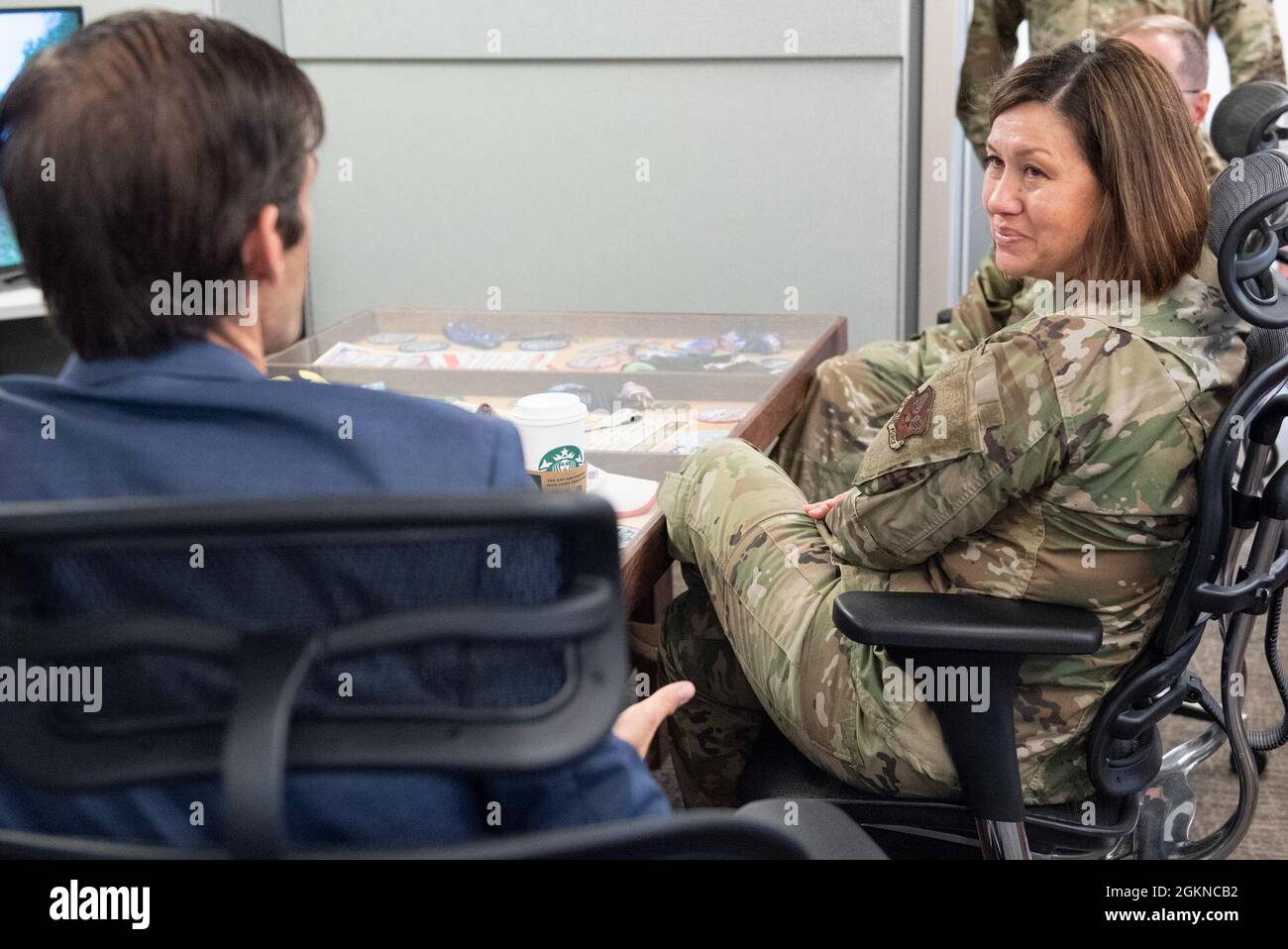 Chief Master Sergeant of the Air Force JoAnne S. Bass is briefed by ...