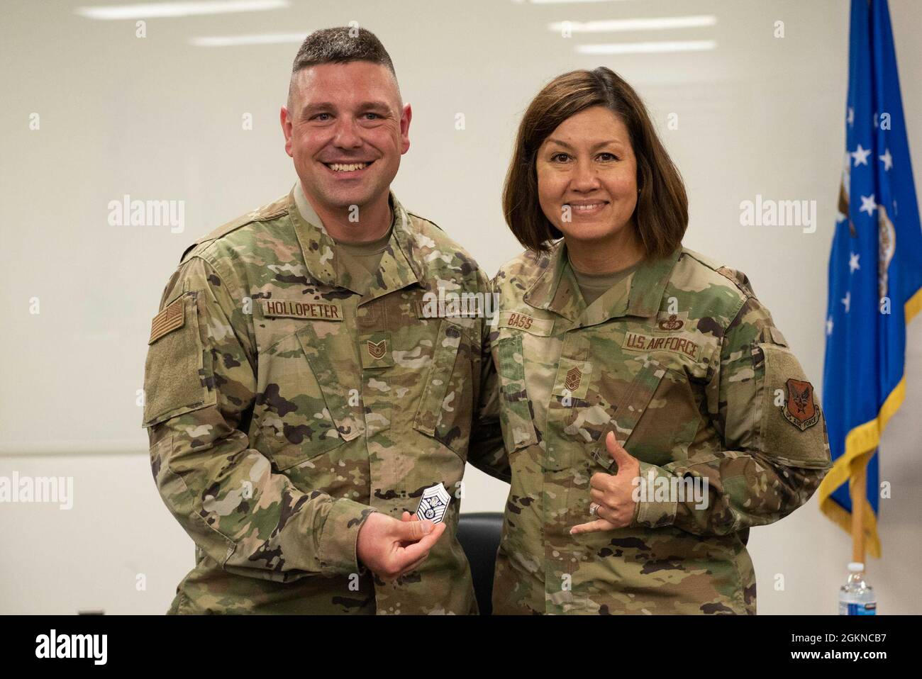 Chief Master Sergeant of the Air Force JoAnne S. Bass presents a coin ...