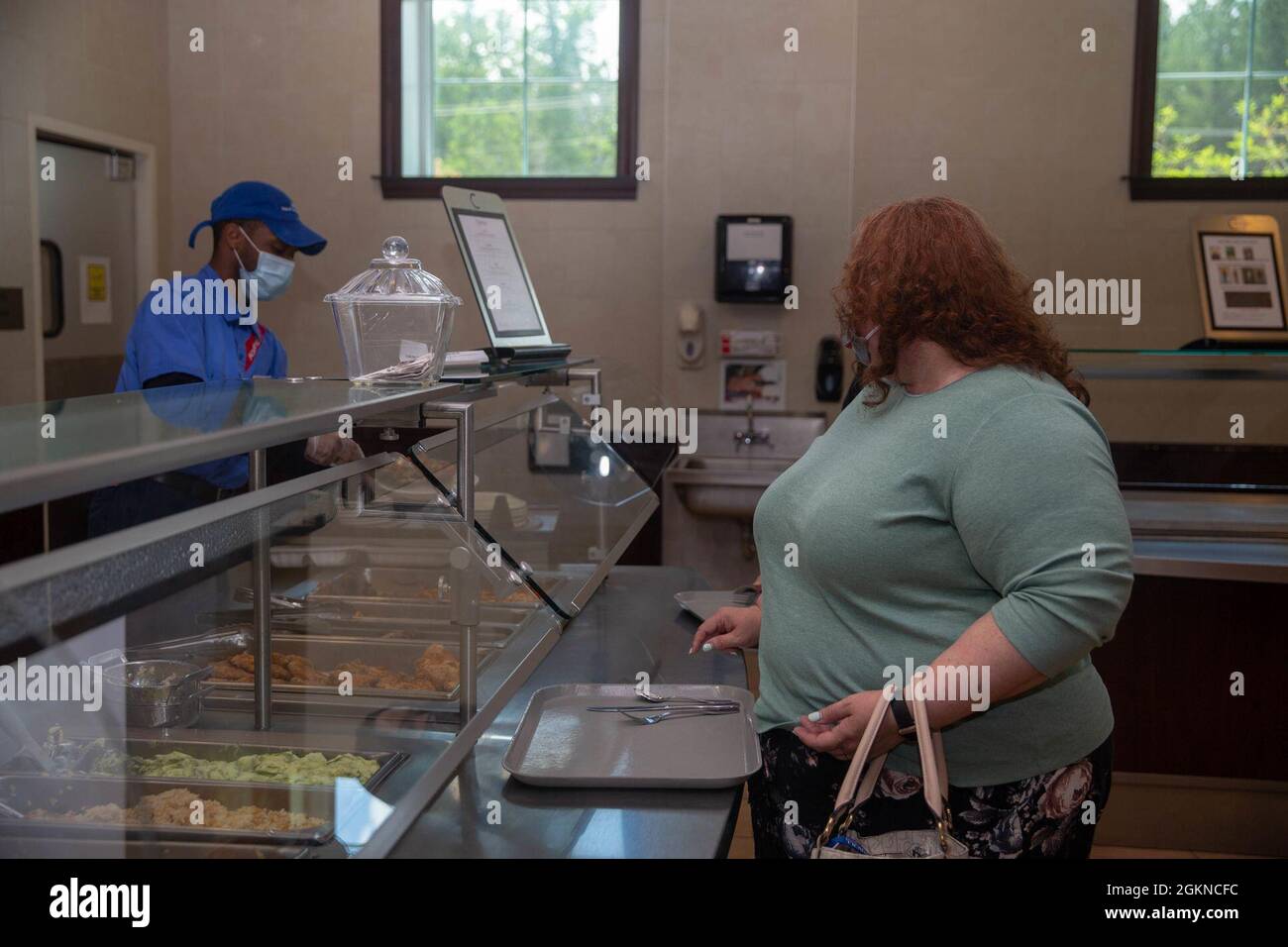 Lisa Davis and Celina Davis visit Malachowski Hall, named after their ...