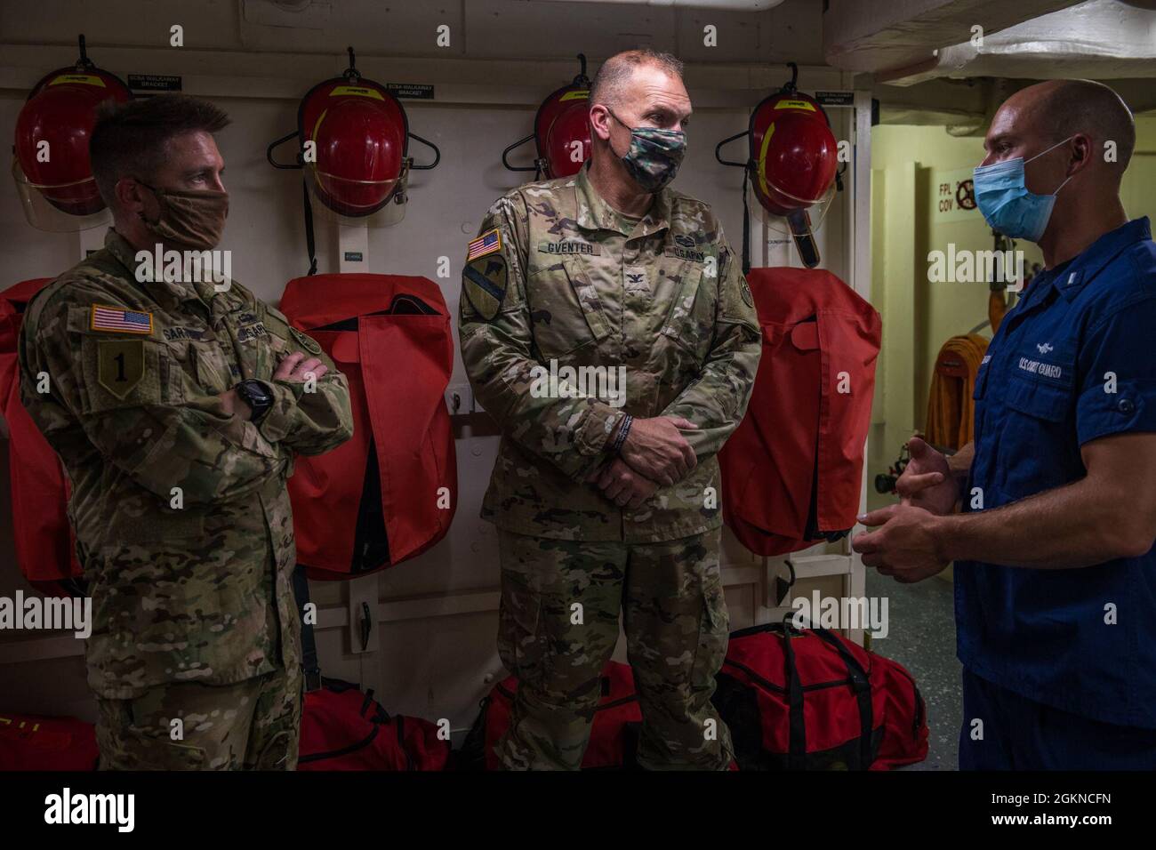 U.S. Coast Guard Lt. j.g. Robert DiRado, right, pursuit mission ...