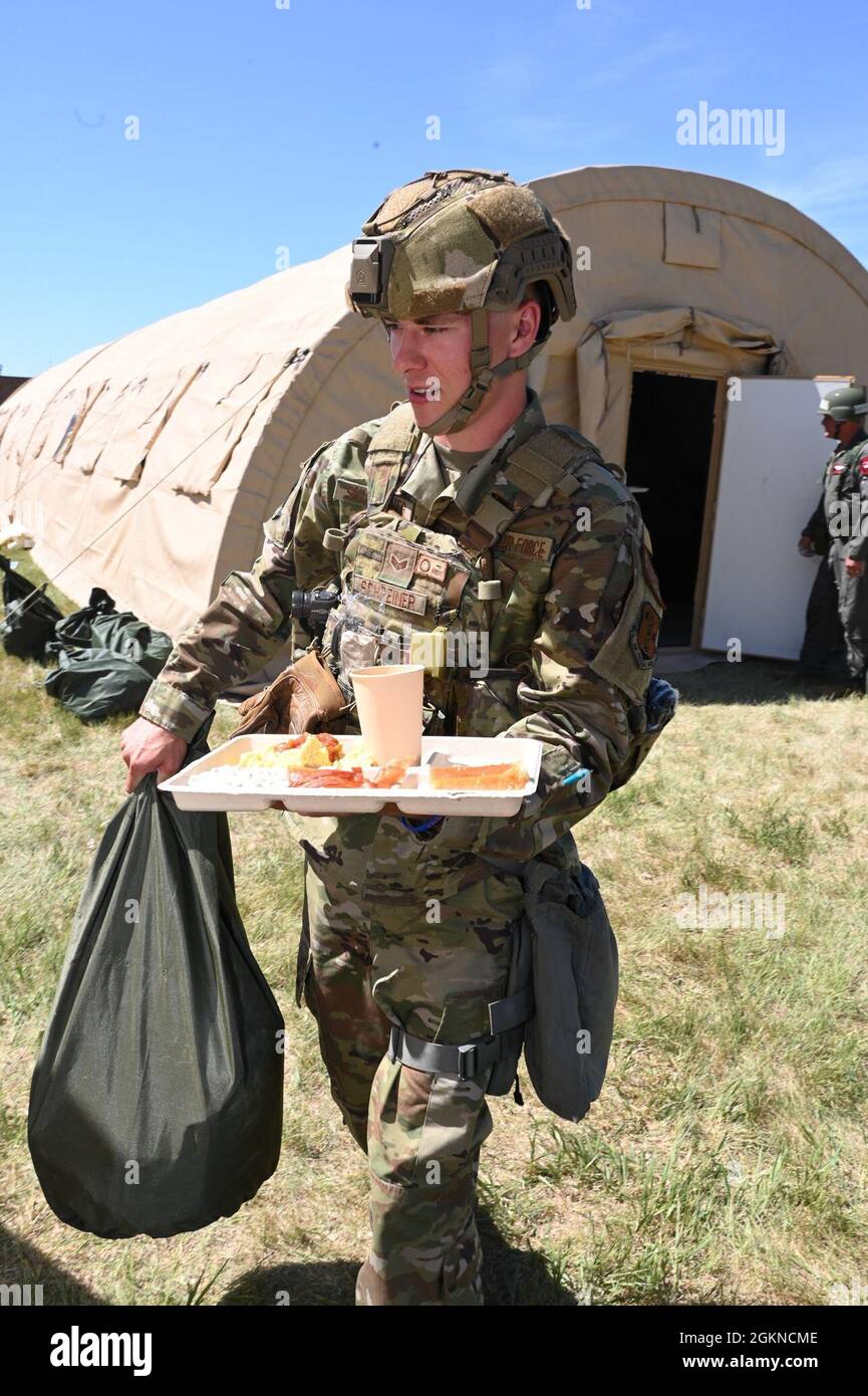 U.S. Air Force Senior Airman Brian Schreiner, of the 119th Security ...