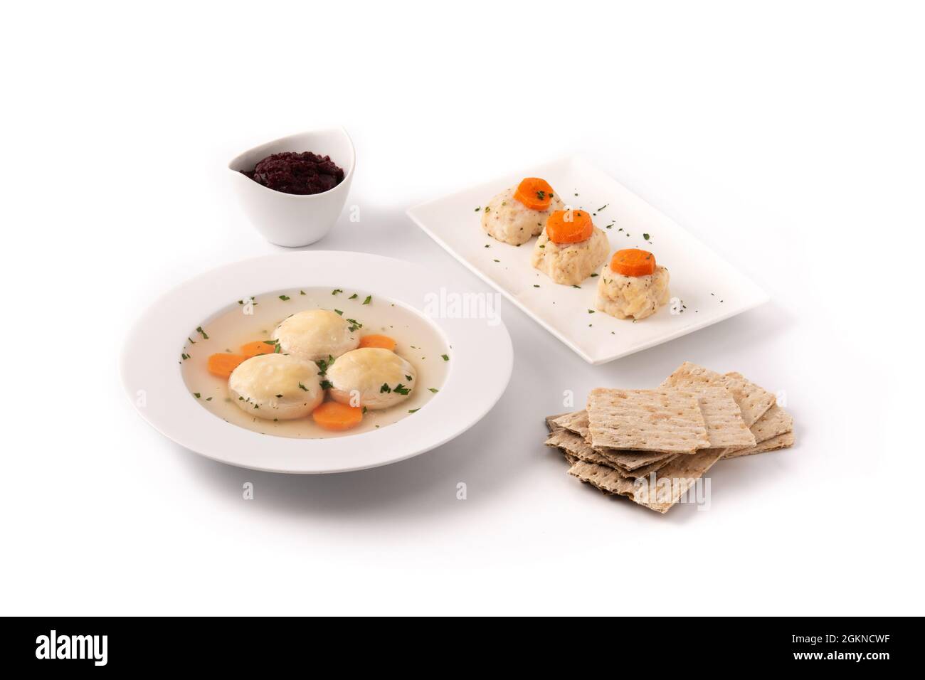 Traditional Jewish matzah ball soup, gefilte fish and matzah bread ...