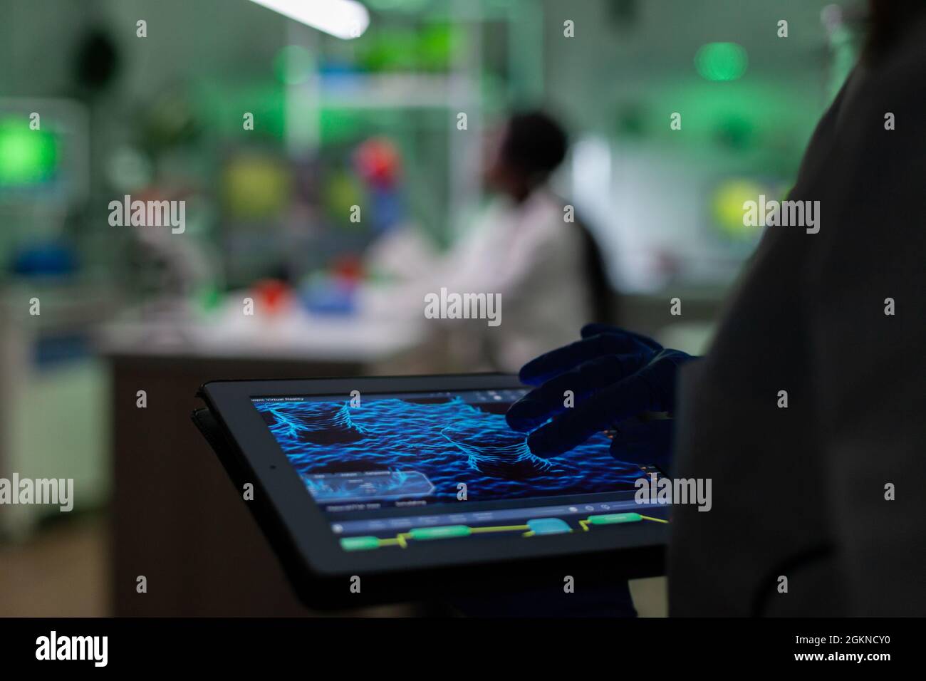 Selective focus on chemist researcher doctor hands using tablet ...