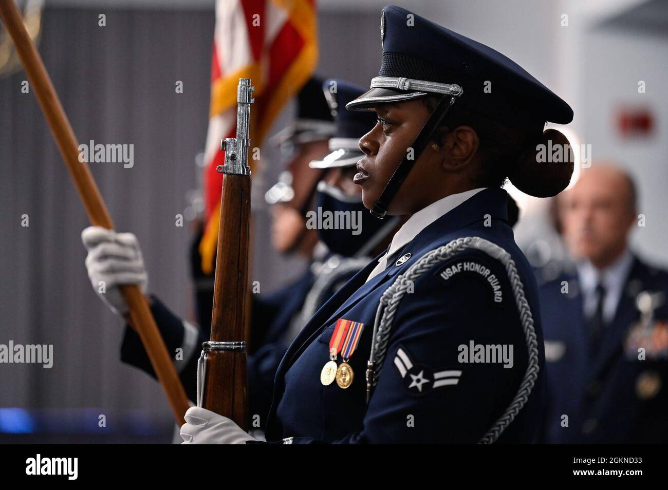 Air Force Honor Guards stand for the national anthem during the ...