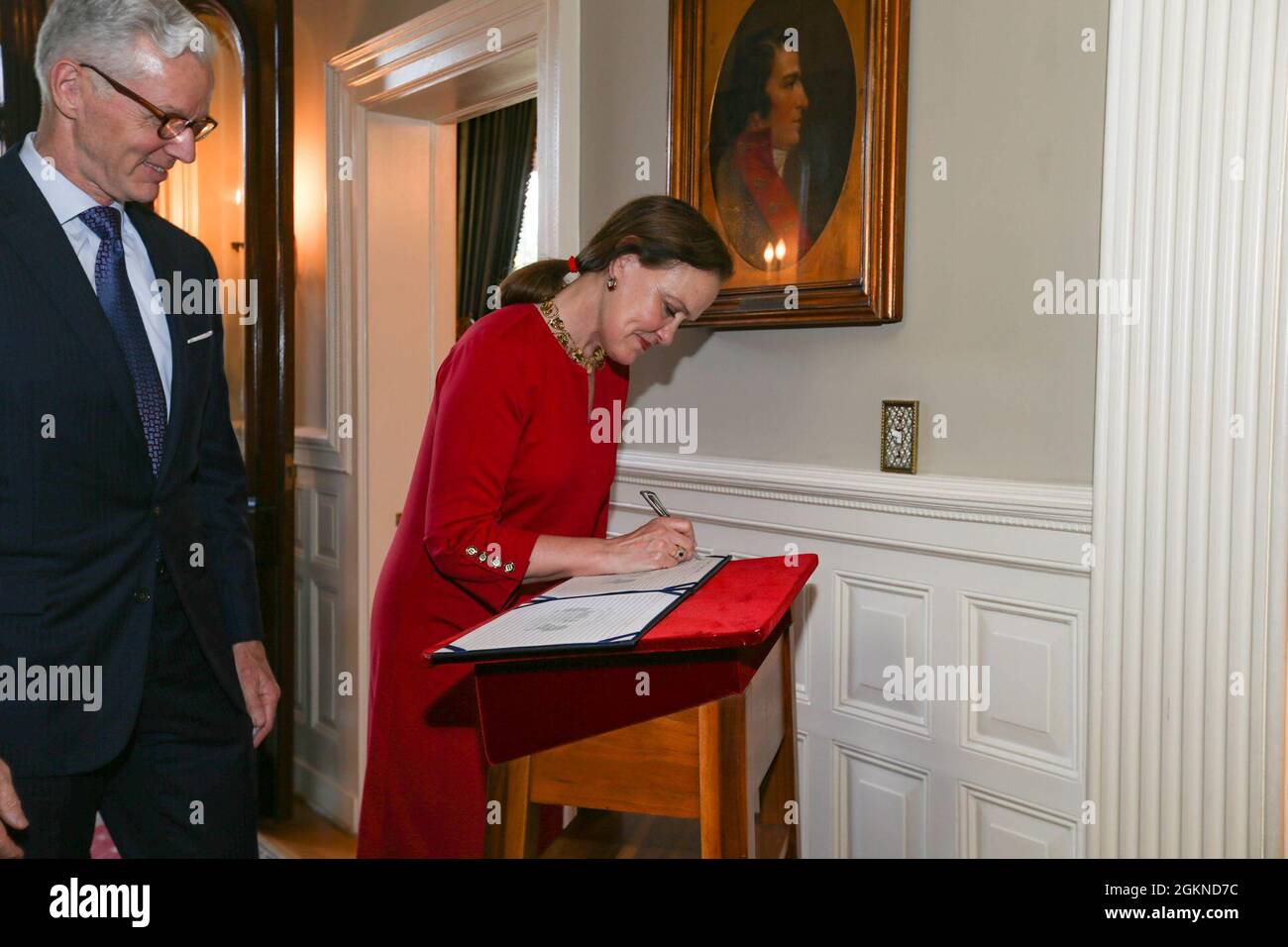 The Honorable Michèle A. Flournoy signs the guest book during the ...