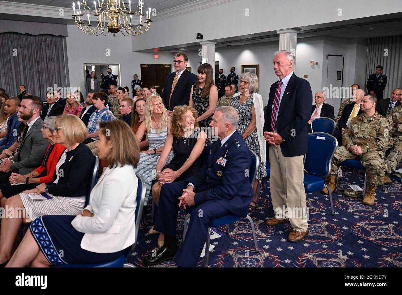 Family members of Lt. Gen. Robert Miller stand in acknowledgment during ...