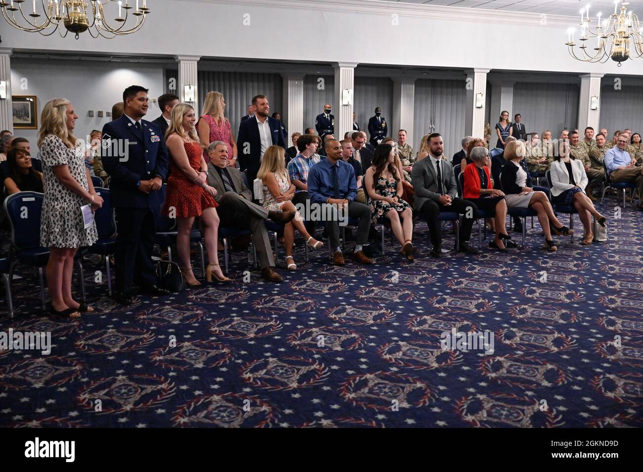 Family members of Lt. Gen. Robert Miller stand in acknowledgment during ...