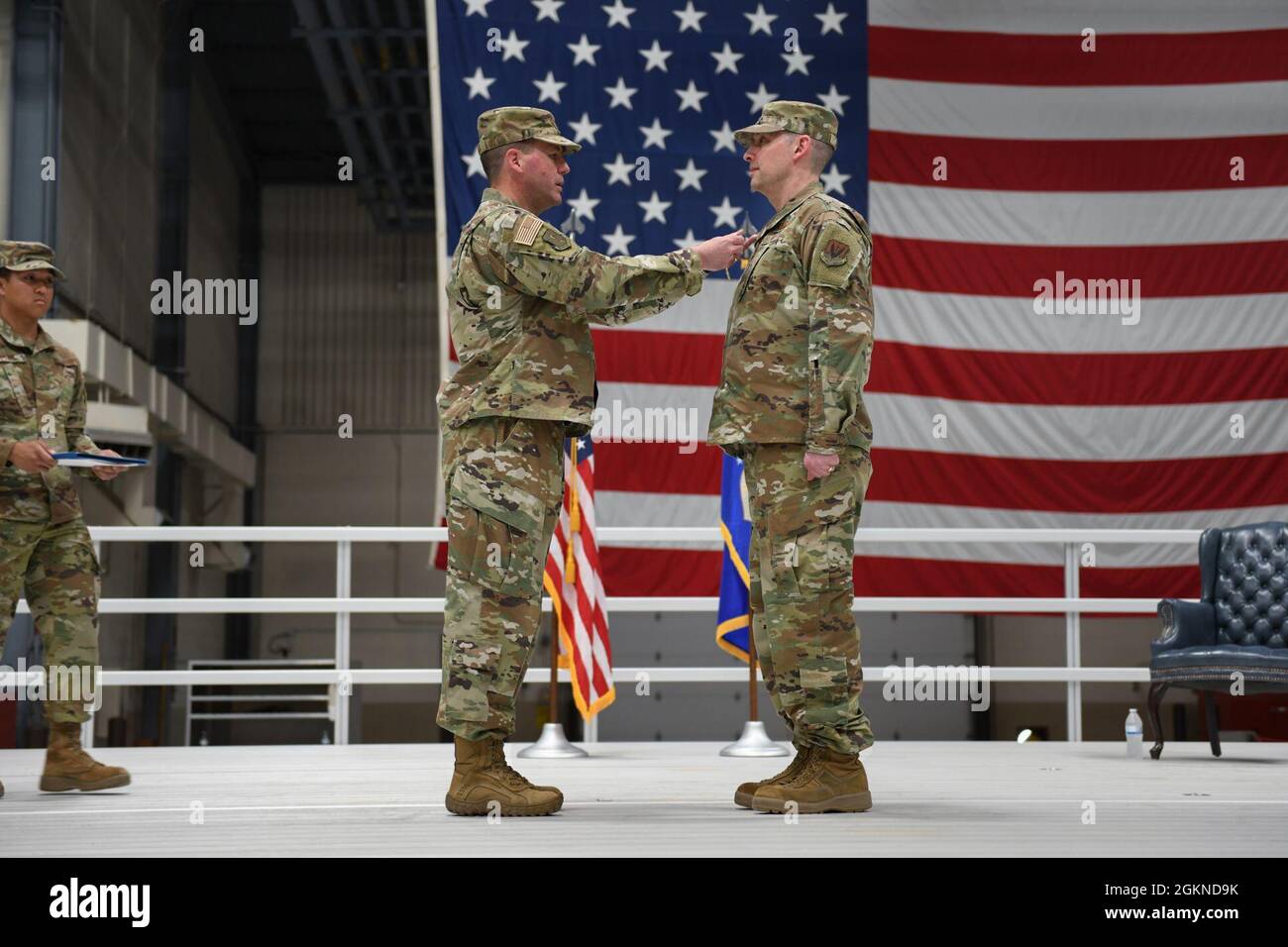 Col. Cameron Pringle, 319th Reconnaissance Wing commander, pins the ...