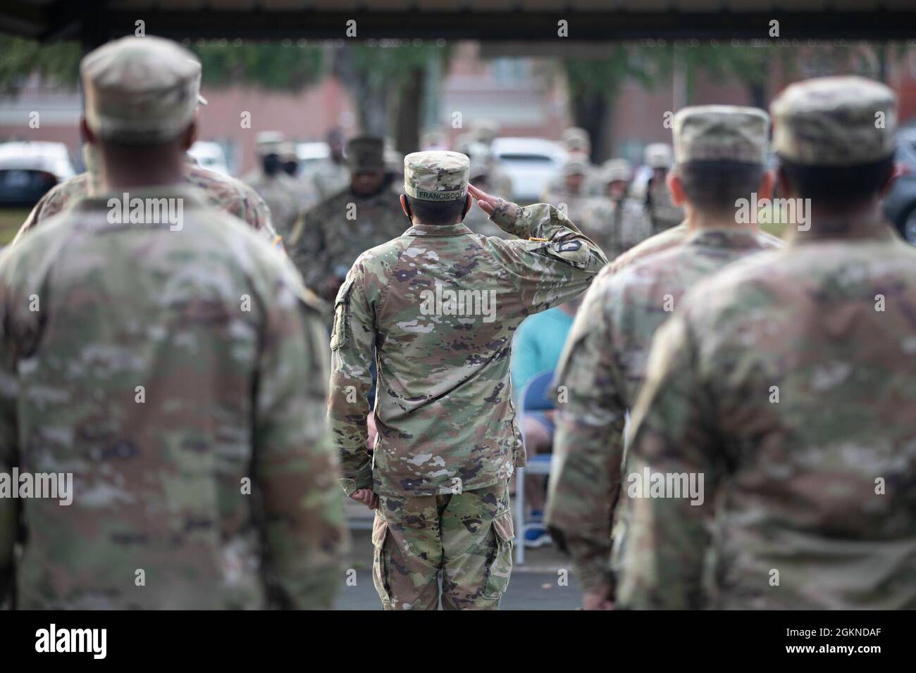 The noncommissioned officer commanding the formation salutes the 603rd ...