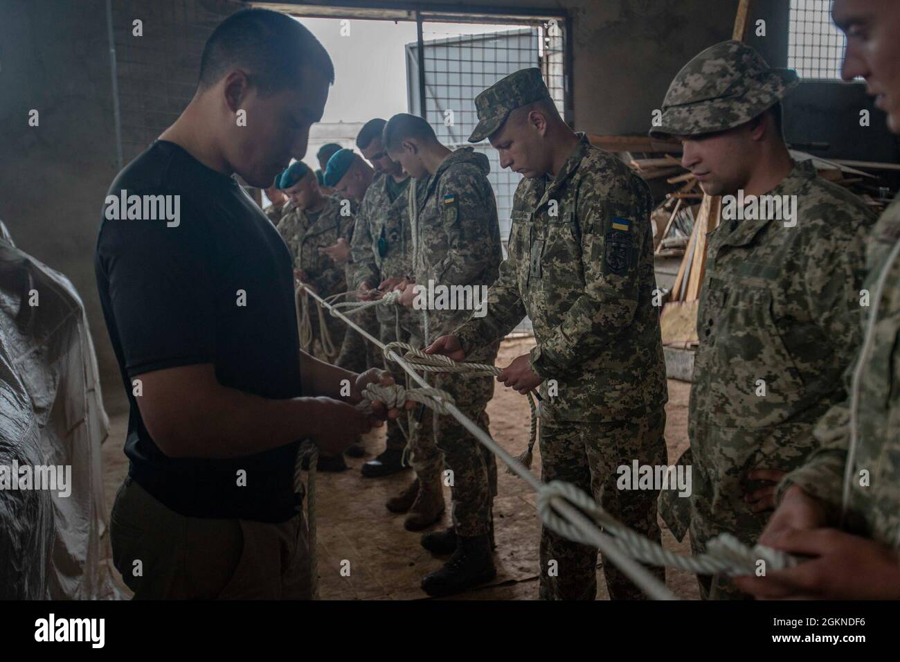 U.S. Marine Corps Staff Sgt. Tyler Ochs, left, an infantry unit leader ...
