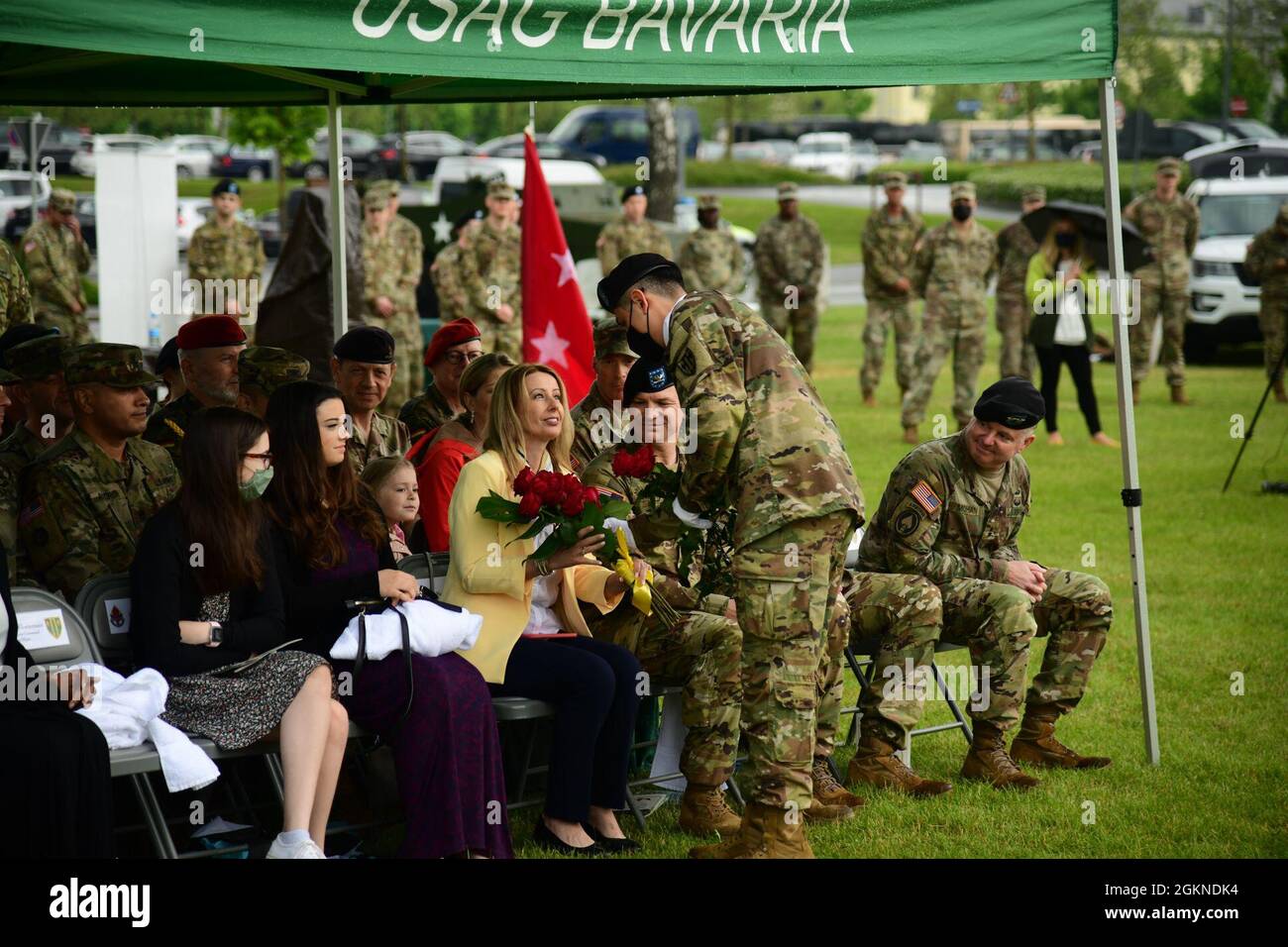 Distinguished guests receive flowers during the 18th Military Police ...