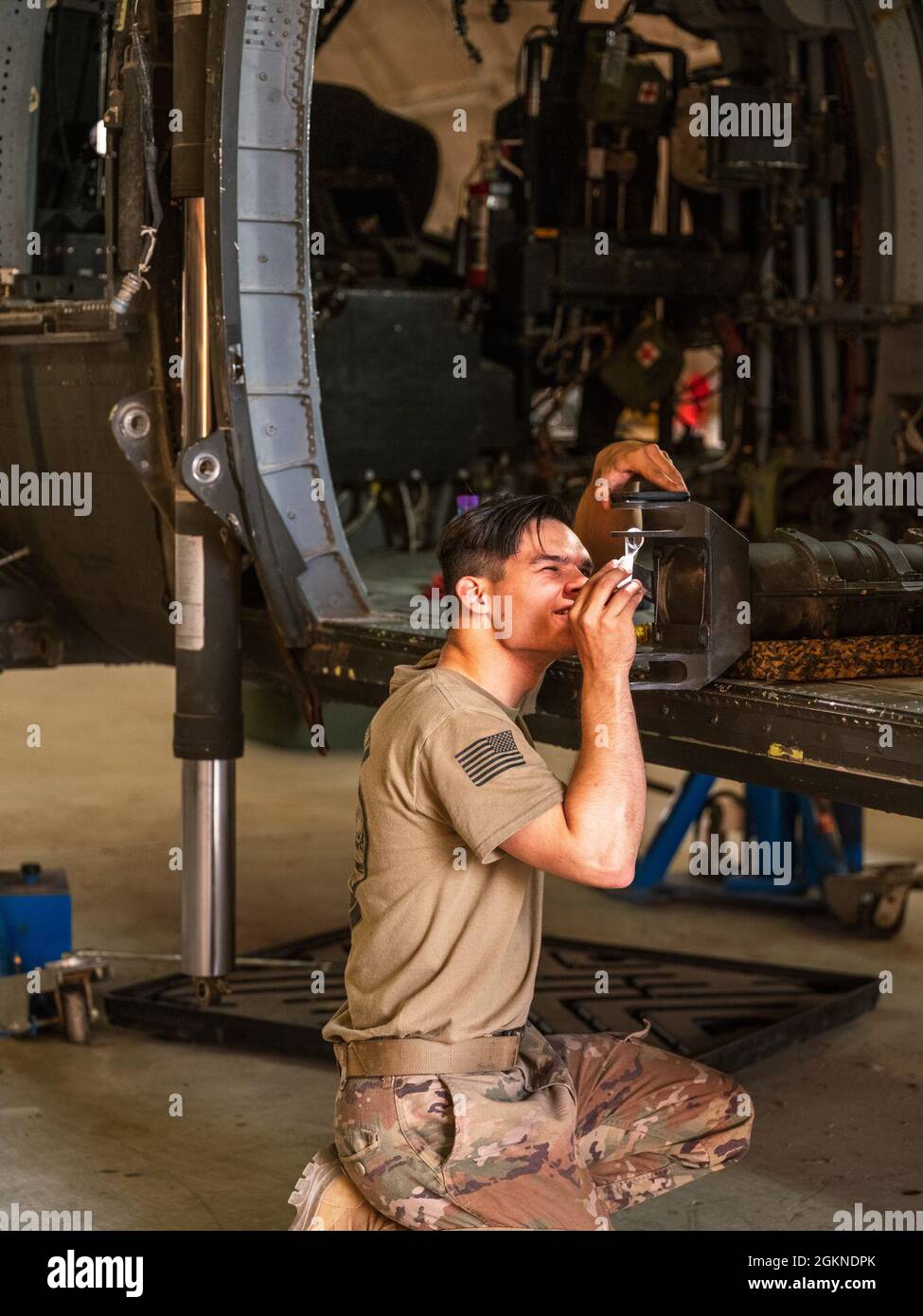 Spc. Thomas Trexler, a 15T UH-60 Black Hawk helicopter technician in B ...