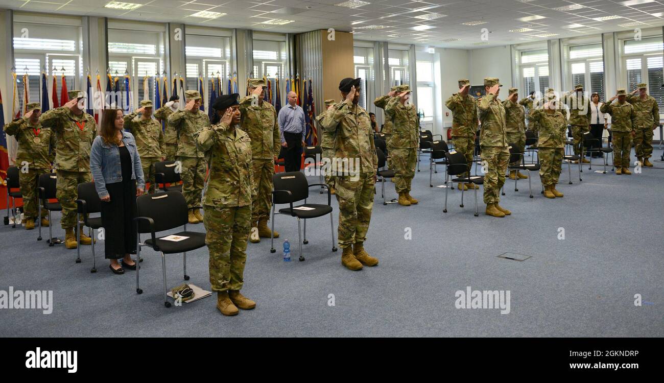 U.S. Soldiers, family and guests render honors as the U.S. and german ...