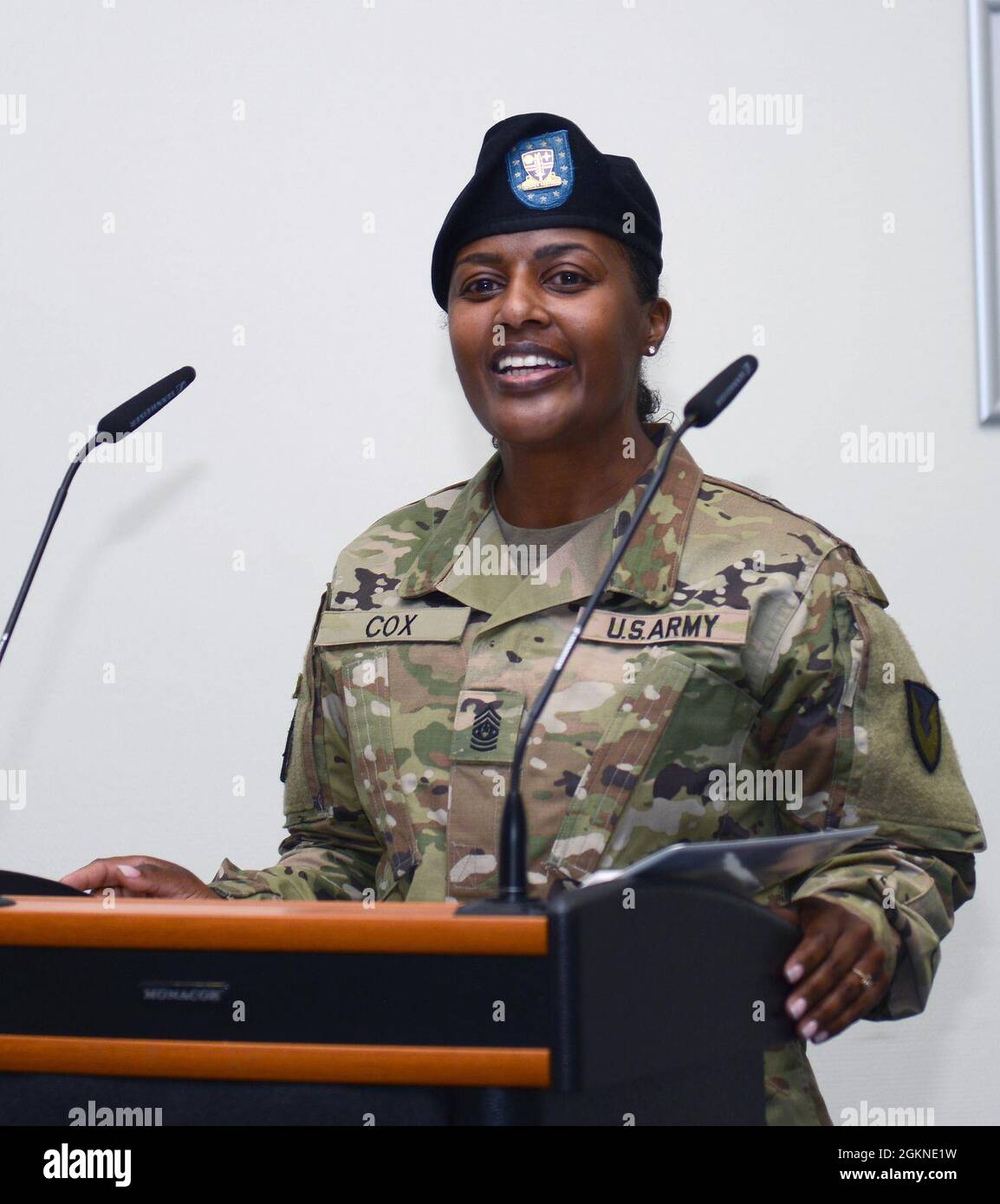 U.S. Army Command Sgt. Maj. Kimala D. Cox, 409th Contracting Support Brigade delivers remarks ...