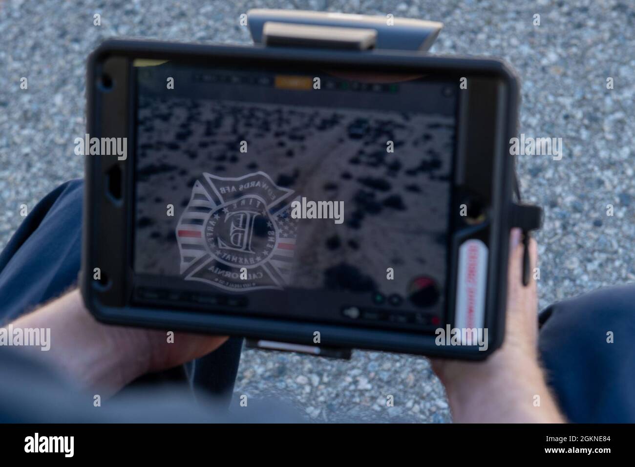 A digital tablet displays an image of an exercise scenario during an ...