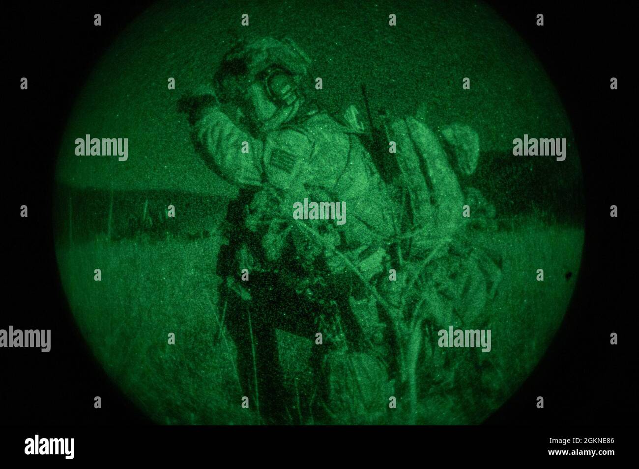 A Greek Special Operations Forces operator delivers a situation report ...