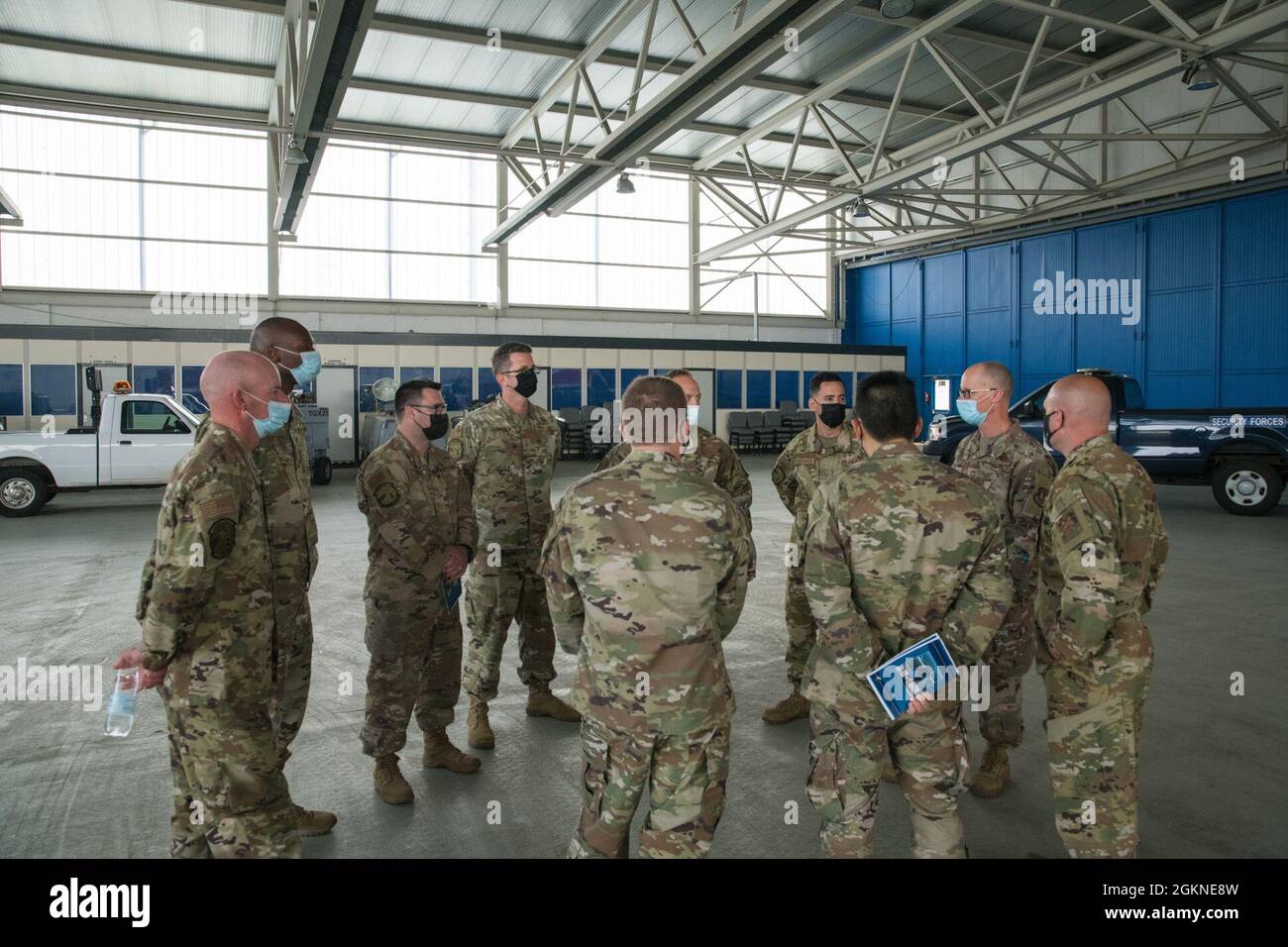 U.S. Air Force Chief Master Sgt. Bryant Roy, second from the right ...