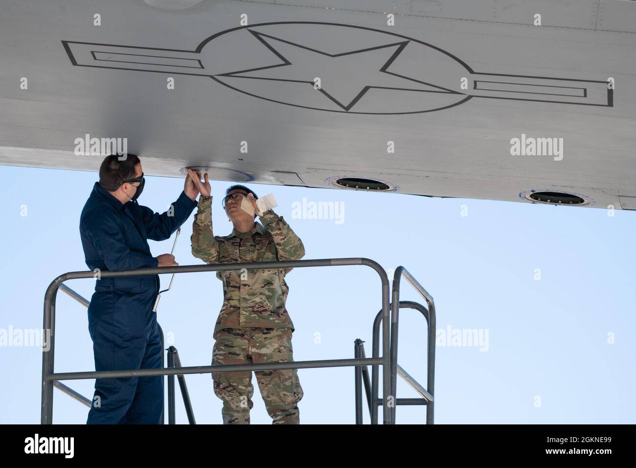 U.S. Air Force Staff Sgt. Tyler Coons, left, 60th Maintenance Squadron ...
