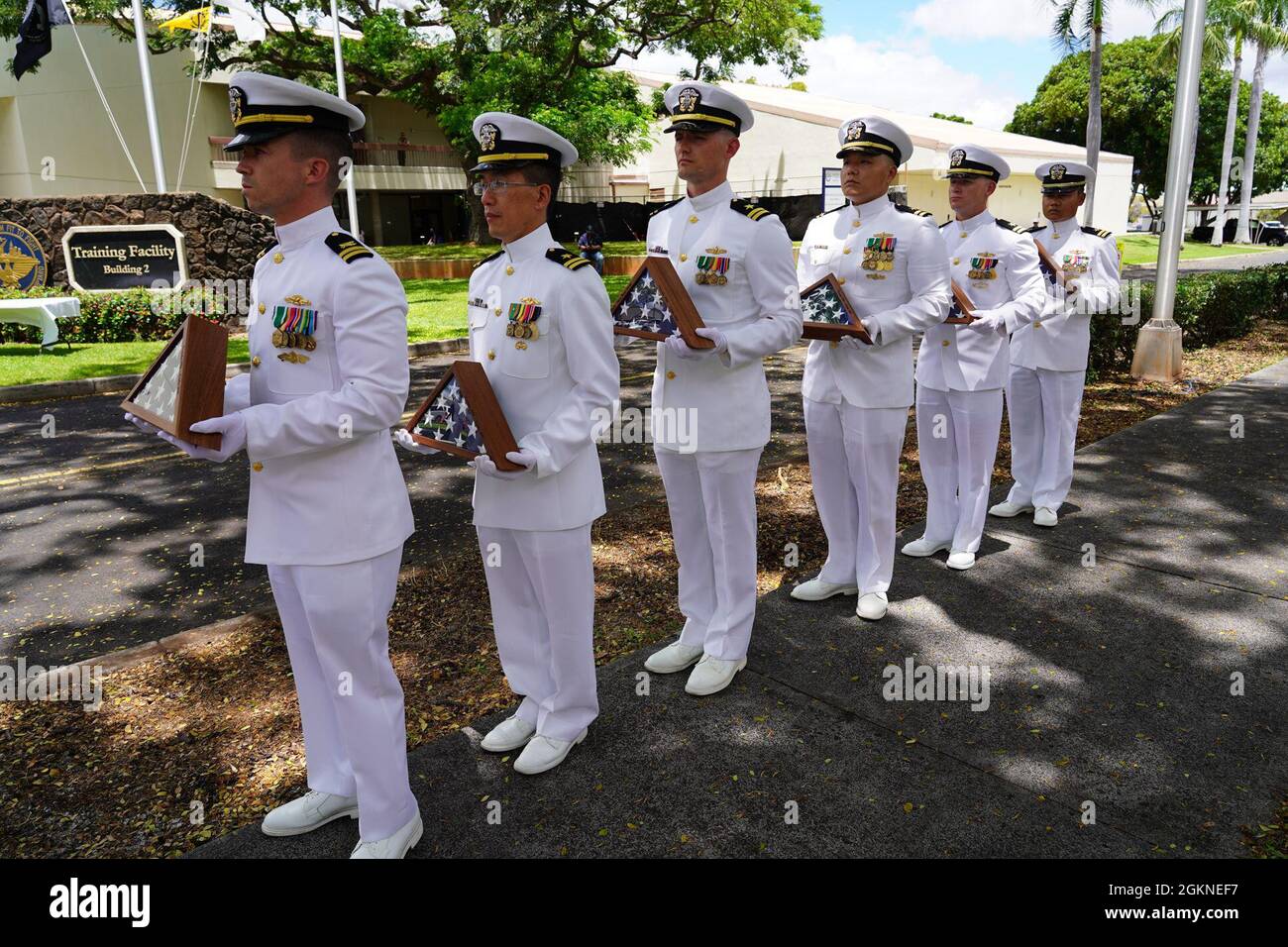 Sailors from Pearl Harbor Naval Shipyard & IMF present the Burton ...