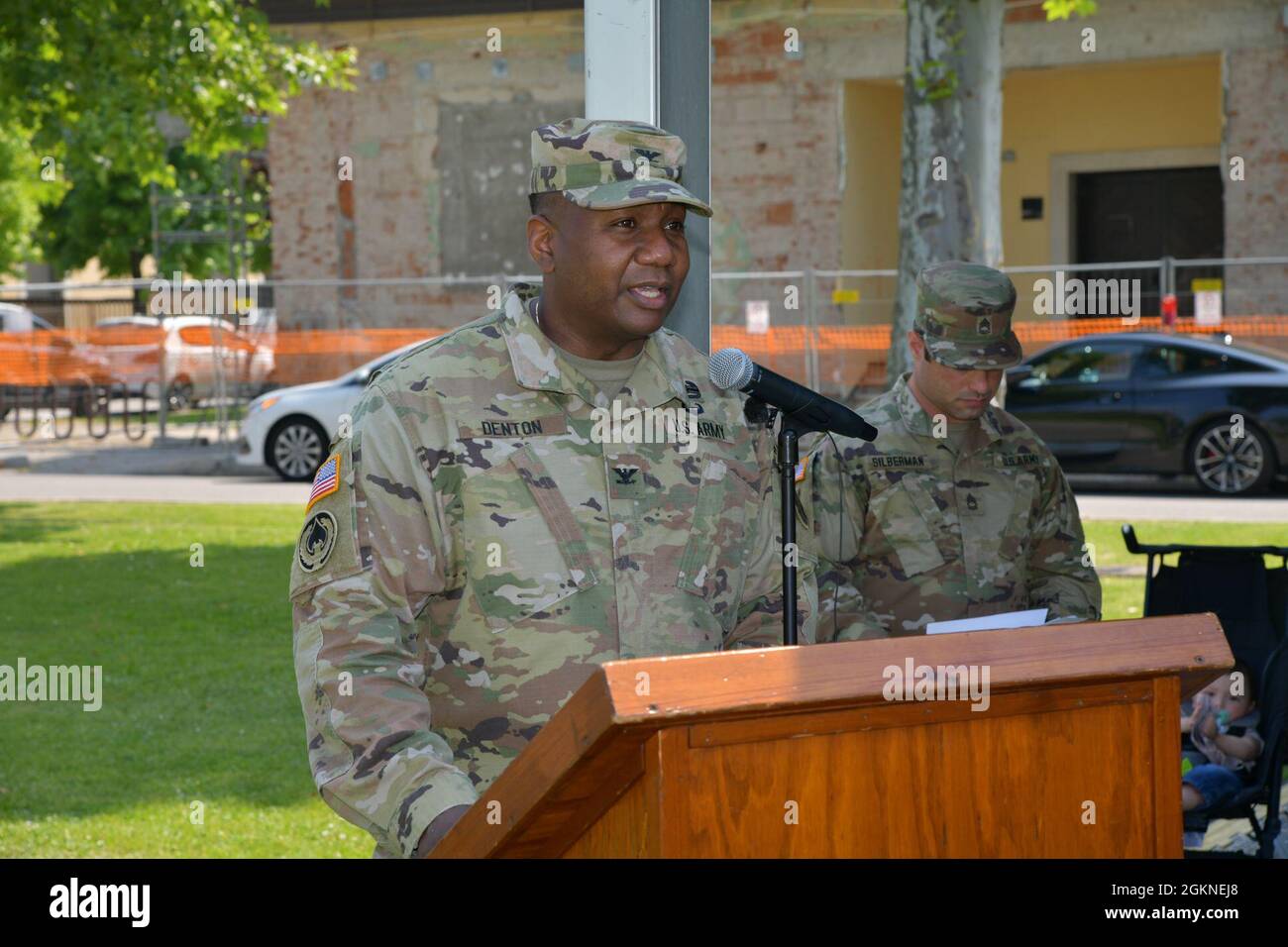 Col. Mark A. Denton, the commander of 207th Intelligence, provides remarks during a change of ...
