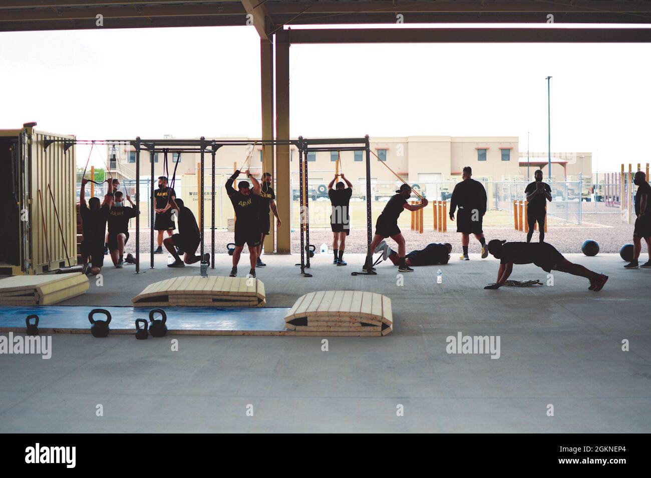 Soldiers from the 1st Armored Division Sustainment Brigade work out at ...