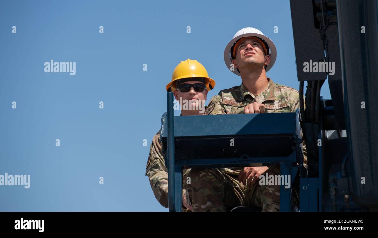 Tech. Sgt. Ian L. McCleod, an electrical systems craftsman, explains ...