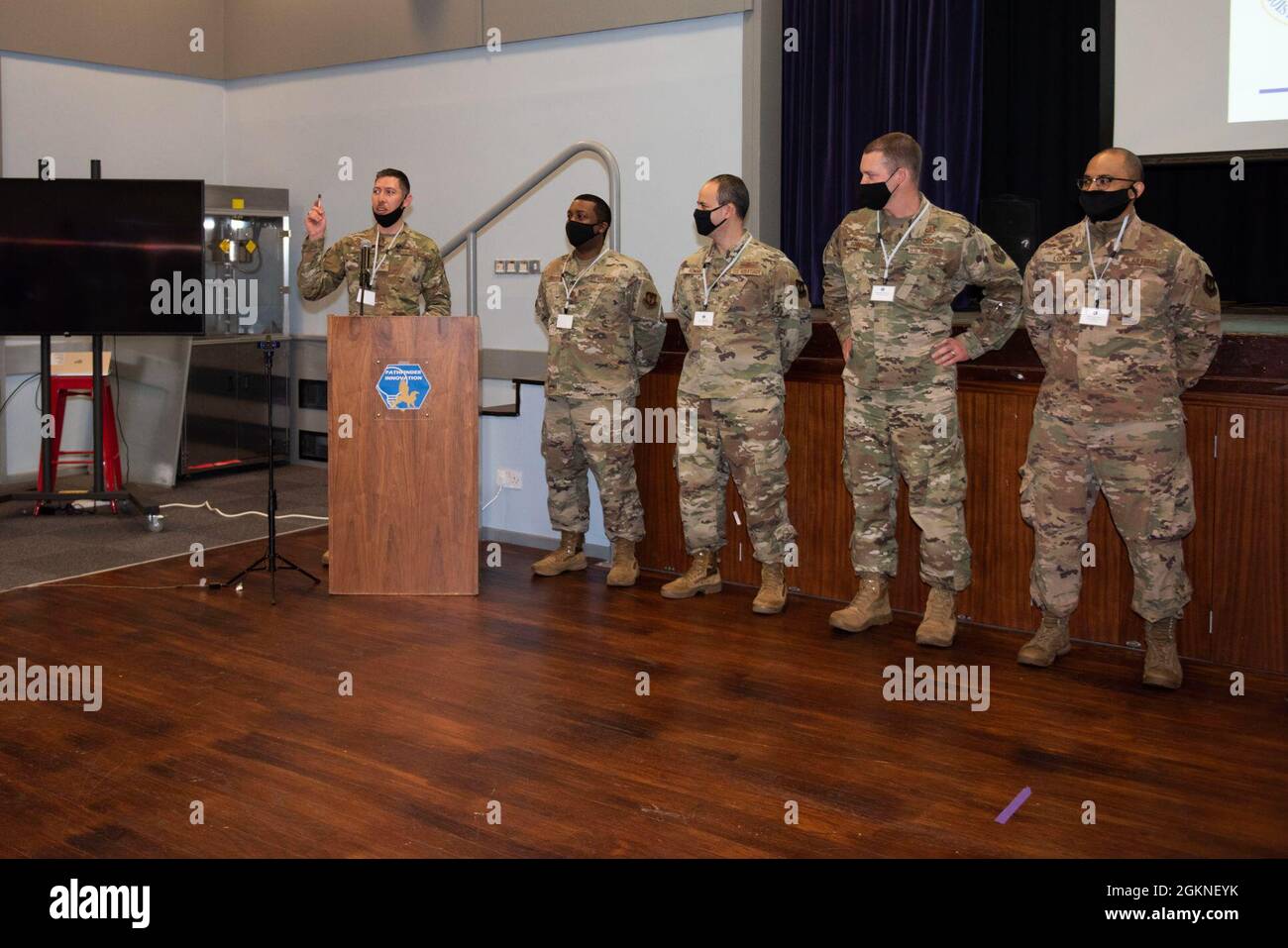 U.S. Air Force Senior Master Sgt. Anthony Luquer, left, 422nd ...