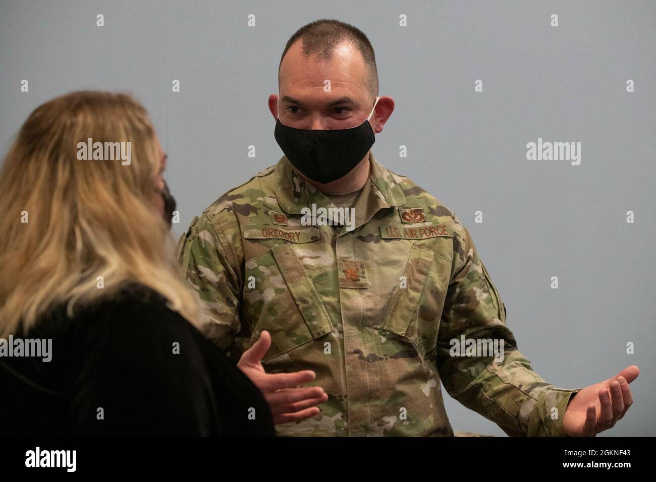 U.S. Air Force Maj. Derek Gregory, right, 422nd Civil Engineer Squadron ...