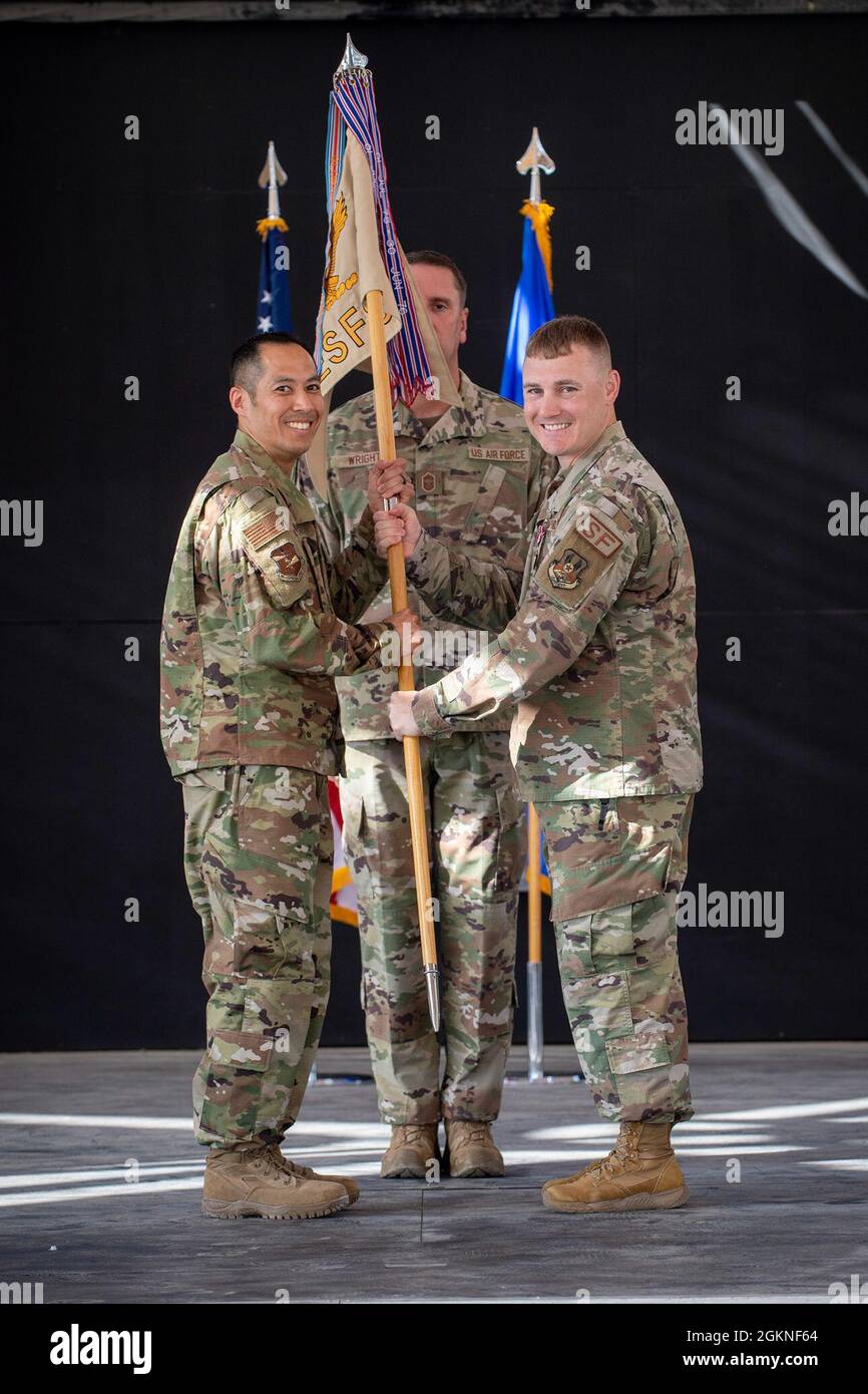 U.S. Air Force Maj. Michael Bruton (right), outgoing 380th ...