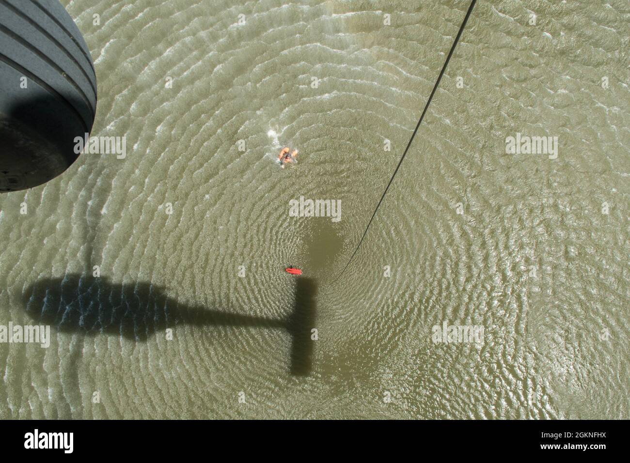 An Airman from the 152nd Airlift Wing in Reno, Nev. gets hoisted out of ...