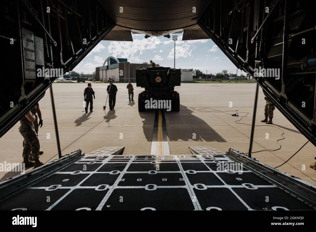 U.S. National Guard service members prepare to load an M142 High ...