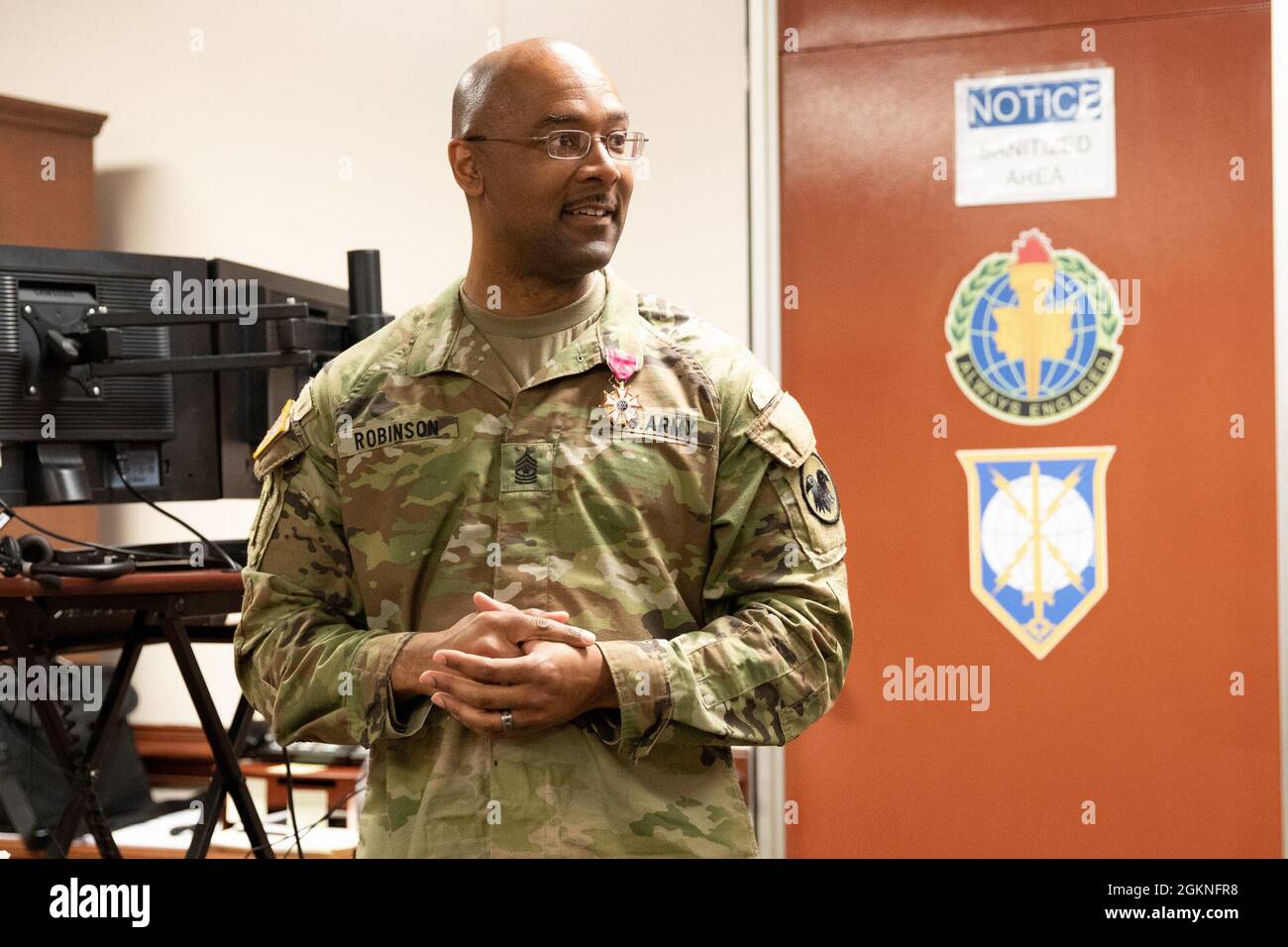 Command Sgt. Maj. Michael Robinson gives his remarks after being ...