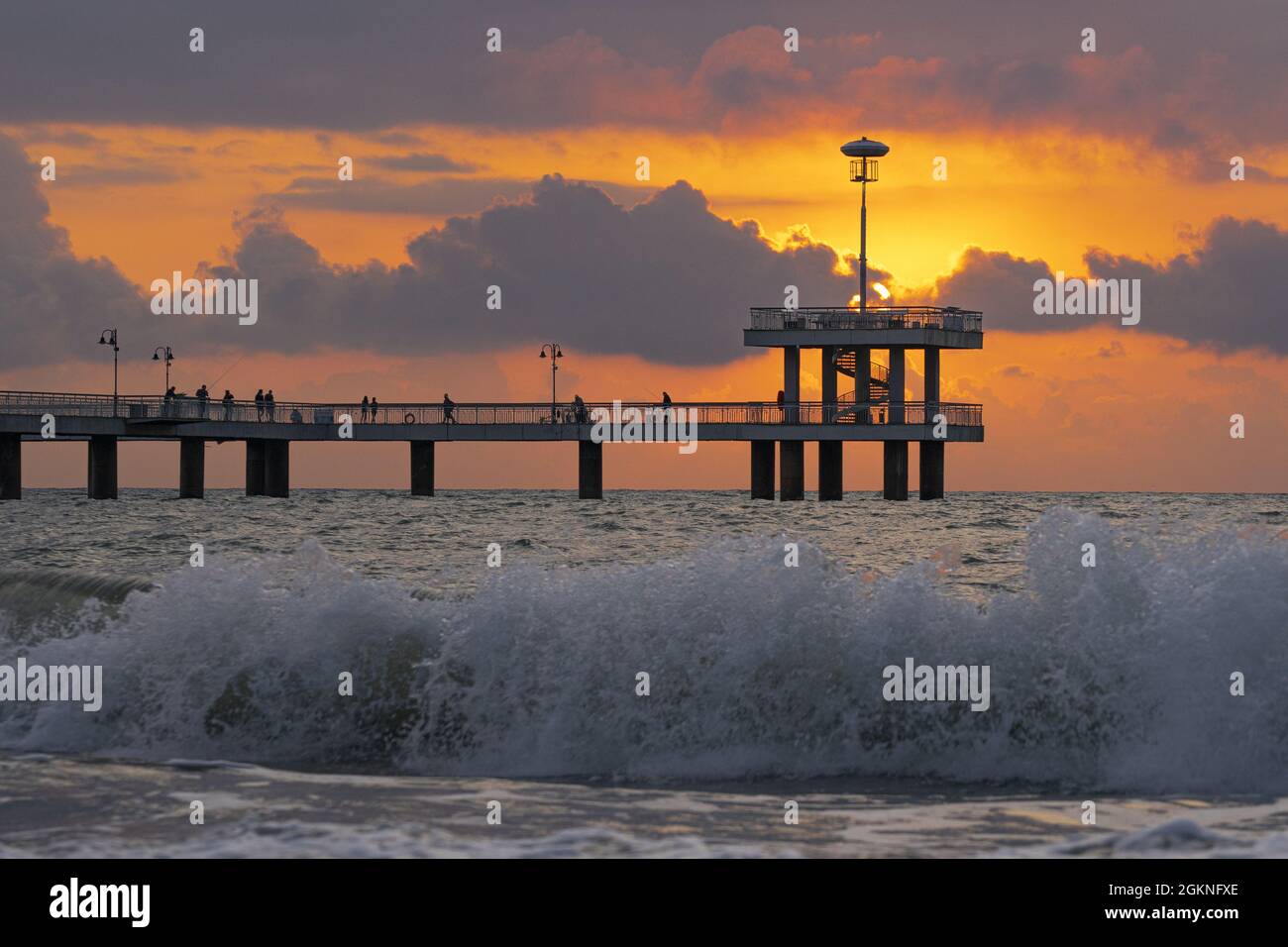 Scenic view of Burgas Bridge next to sea garden with sunset background ...