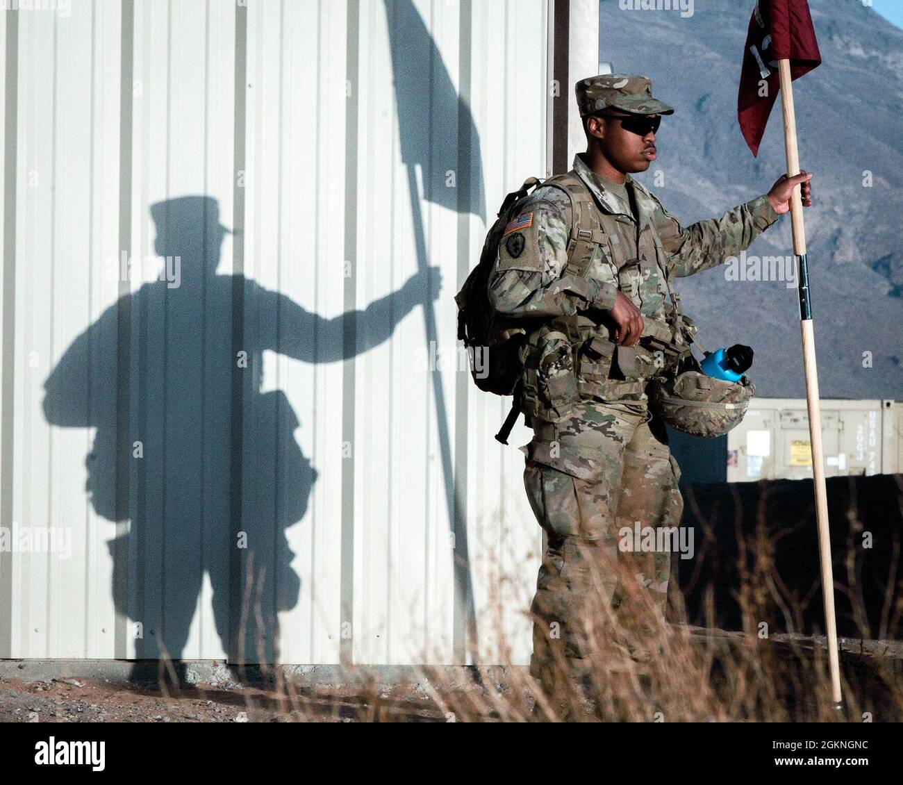 A 131st Field Hospital Soldier places the unit colors outside of the ...