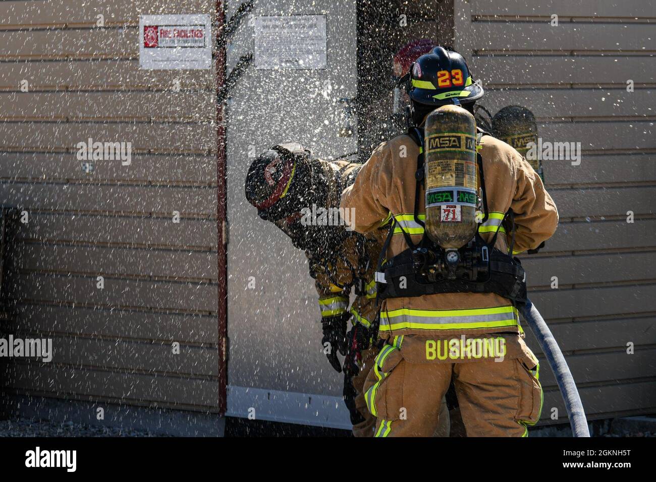 Firefighters assigned to the 90th Civil Engineer Squadron practice ...