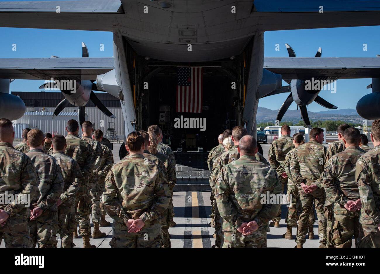 Members of the 152nd Aircraft Maintenance Squadron (AMXS) stand on the ...