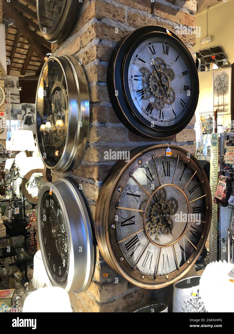 The dials of the old antique classic clocks on a vintage wide paper ...