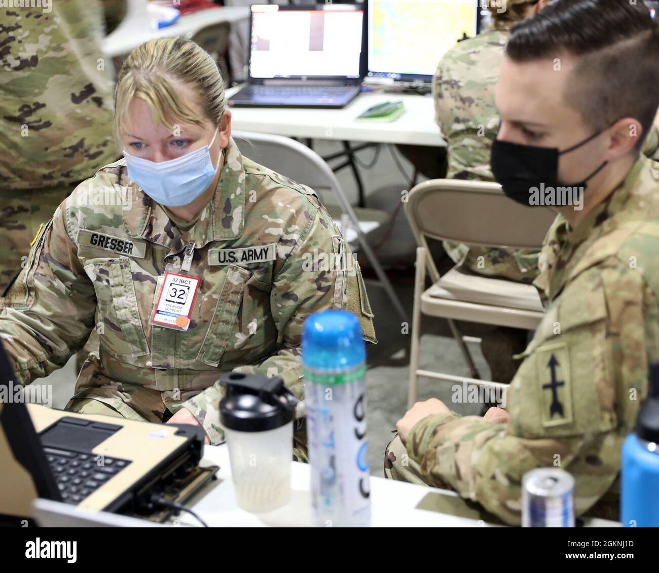 Cpt. Dorff and Staff Sgt. Gresser, soldiers with the 32nd “Red Arrow ...
