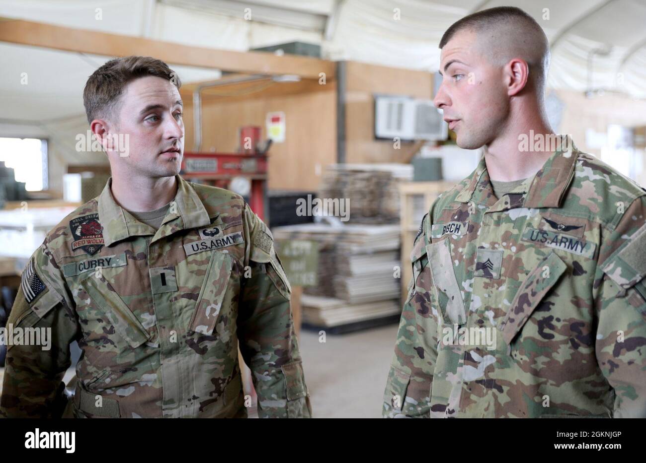 First Lt. Colton Curry, left, a pilot, and Sgt. David Busch, an attack ...