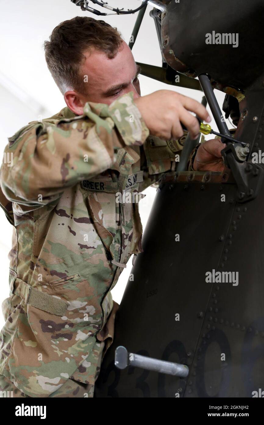 Spc. Anthony Greer, an attack helicopter repairer with Alpha Company ...