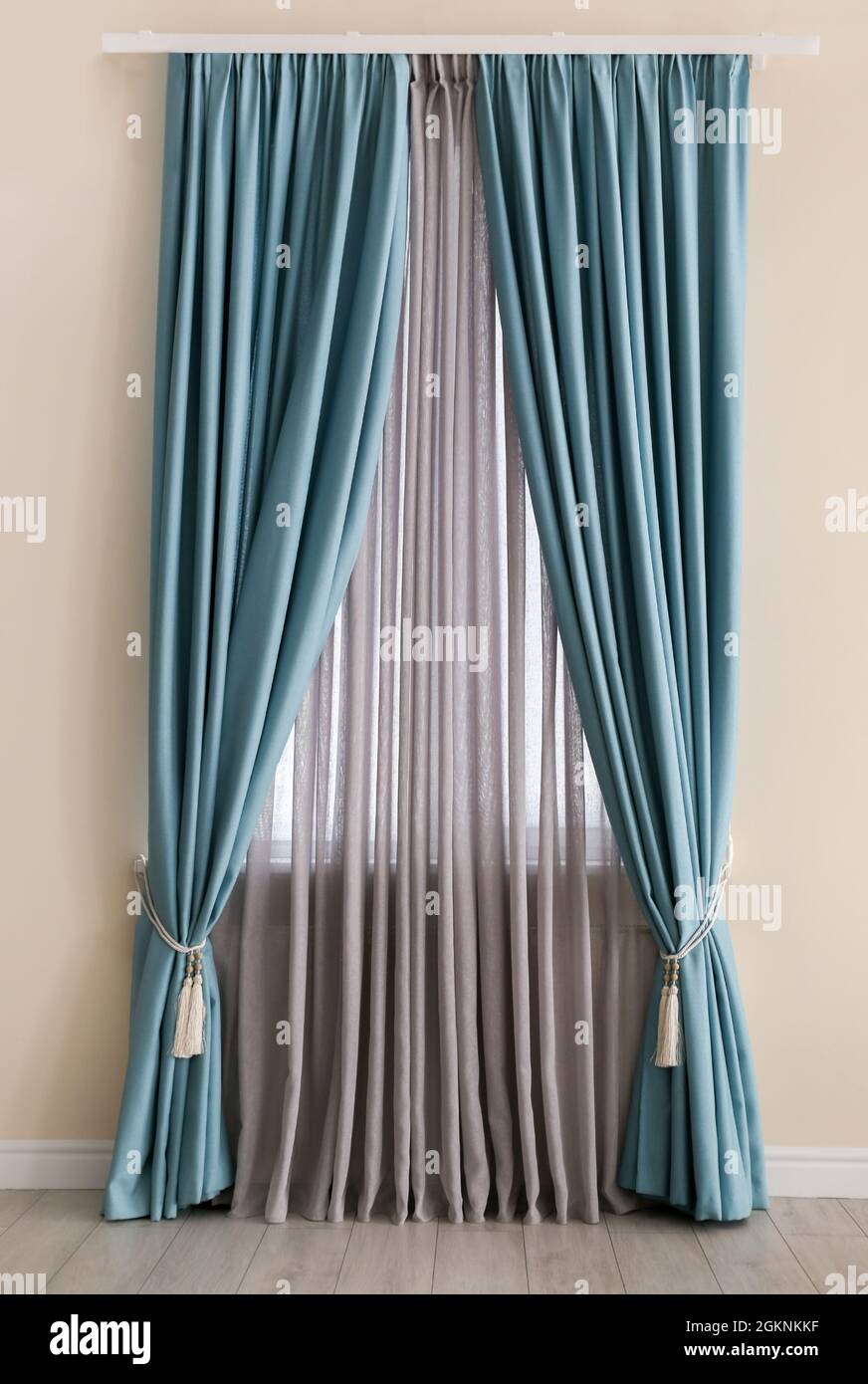 Beautiful colorful curtains in room Stock Photo - Alamy