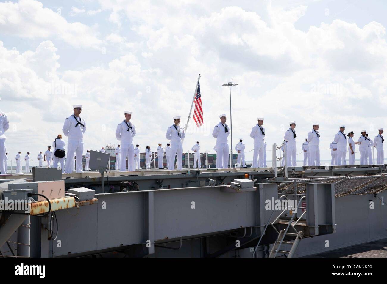 Sailors assigned to USS Gerald R. Ford (CVN 78) man the rails in honor ...