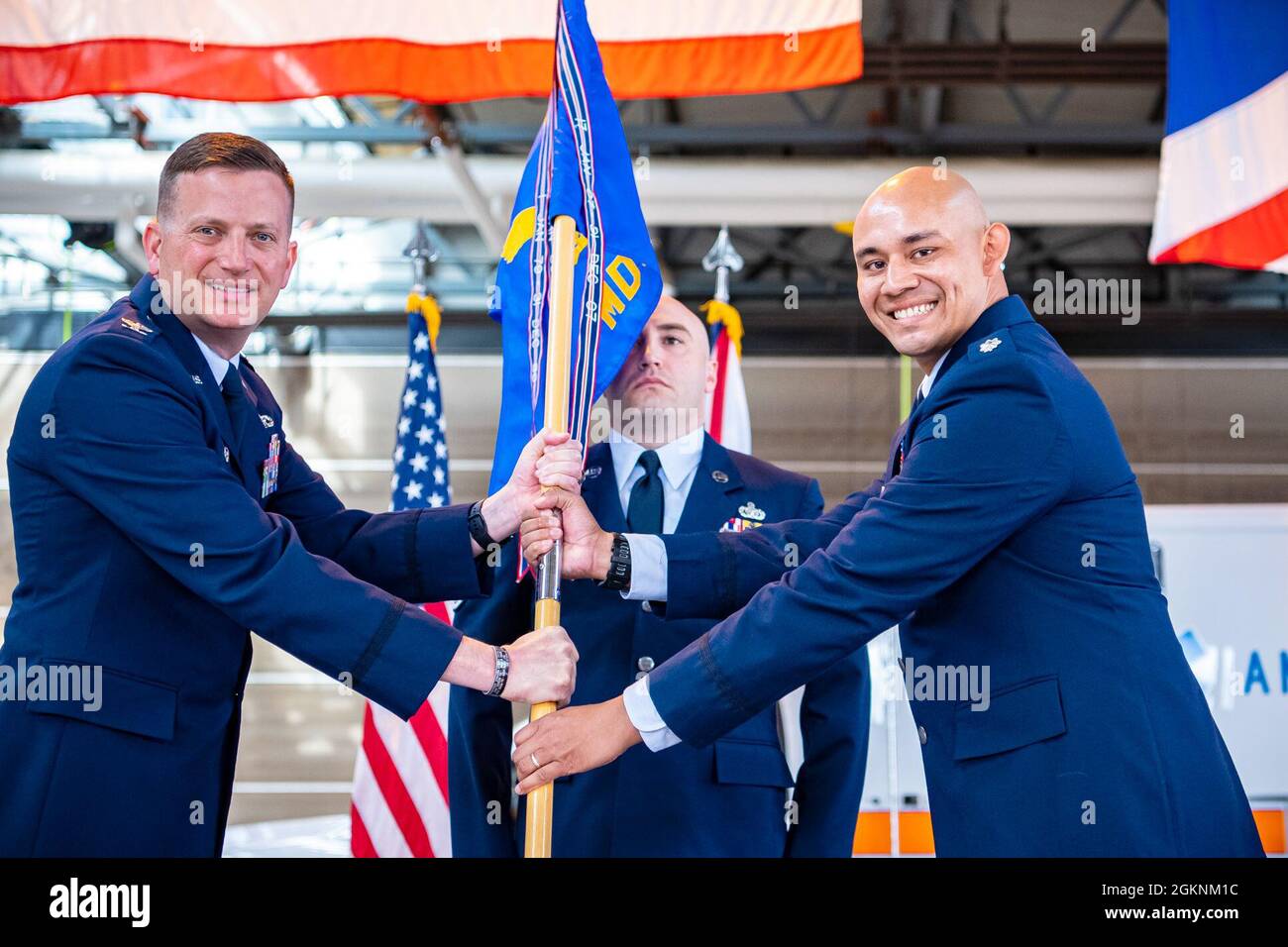 U.S. Air Force Col. Richard Martin, 423rd Air Base Group commander, presents the 423rd Medical ...