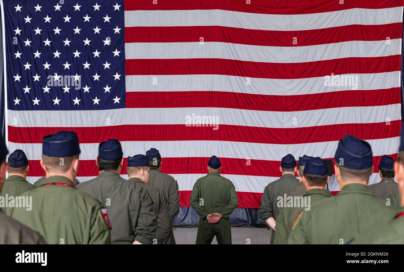United States Air Force Airmen stand in formation during a change of ...